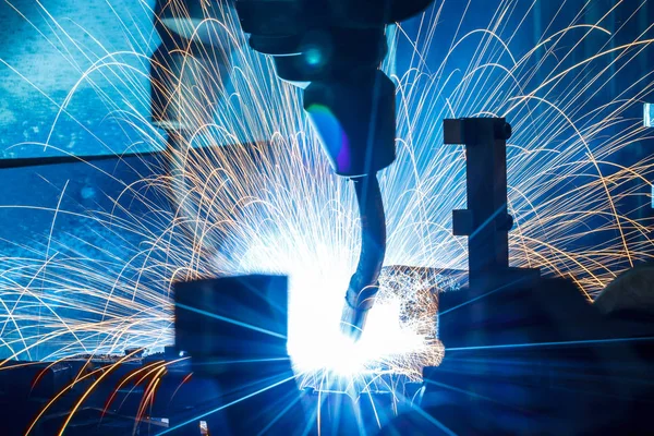 Movimiento autom tico de robots de soldadura en una f brica de autom viles 2024