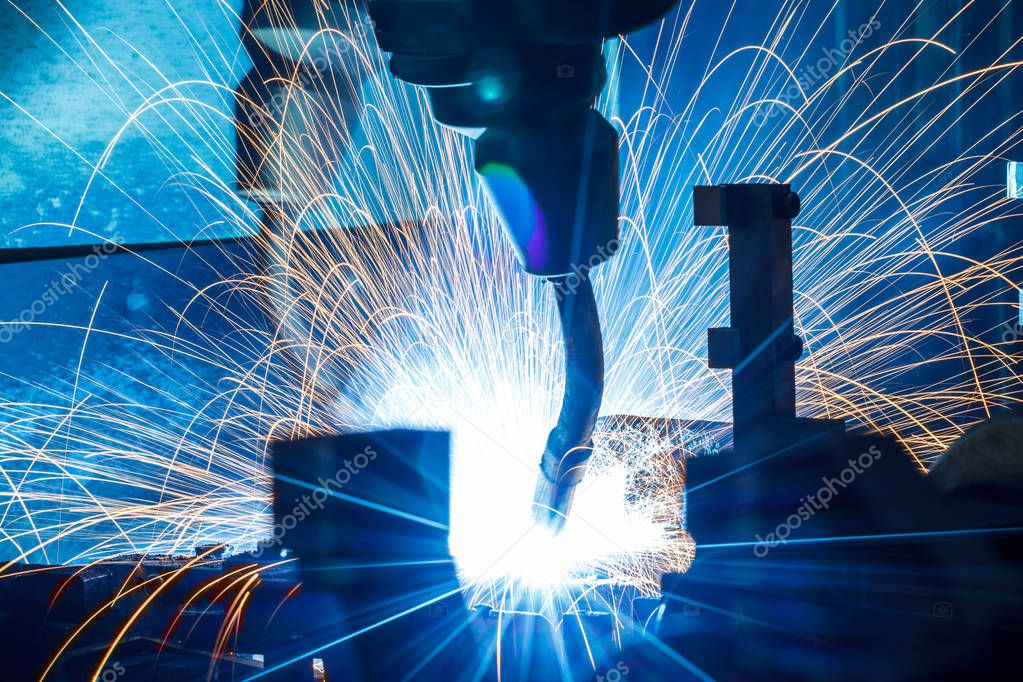 Movimiento autom tico de robots de soldadura en una f brica de autom viles 2024