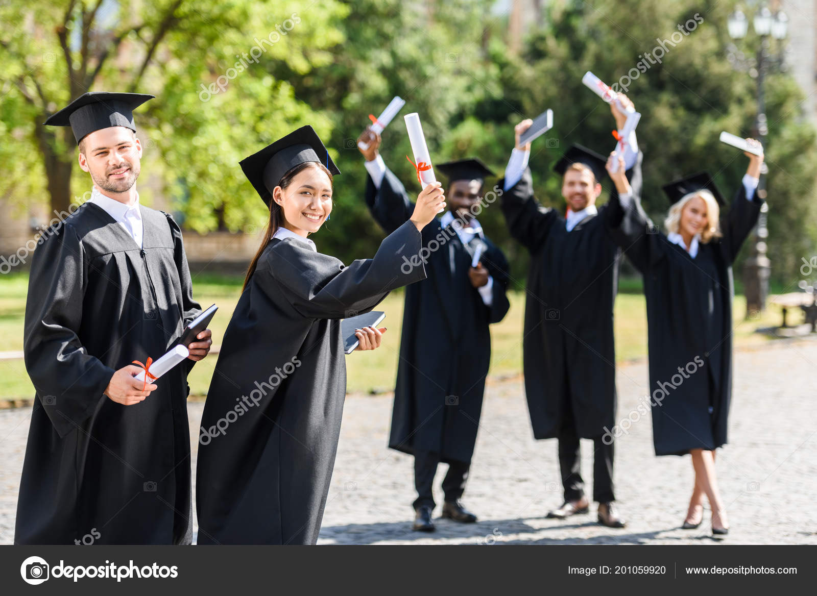 Young Graduated Students Standing Together University Garden Looking ...