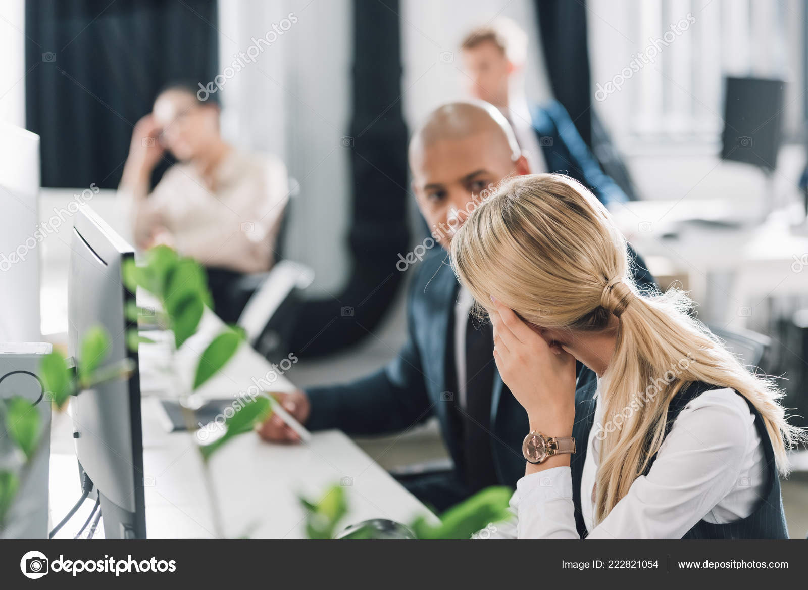 Young Multiethnic Business People Looking Each Other While Working