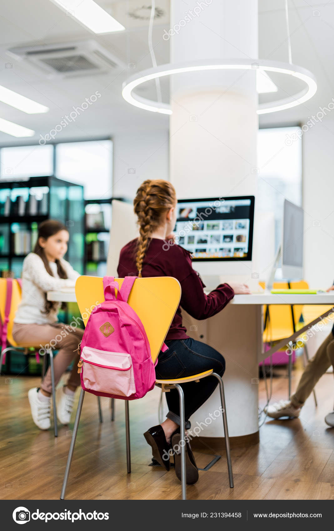 Focused Schoolgirls Sitting Using Desktop Computers Library — Stock ...