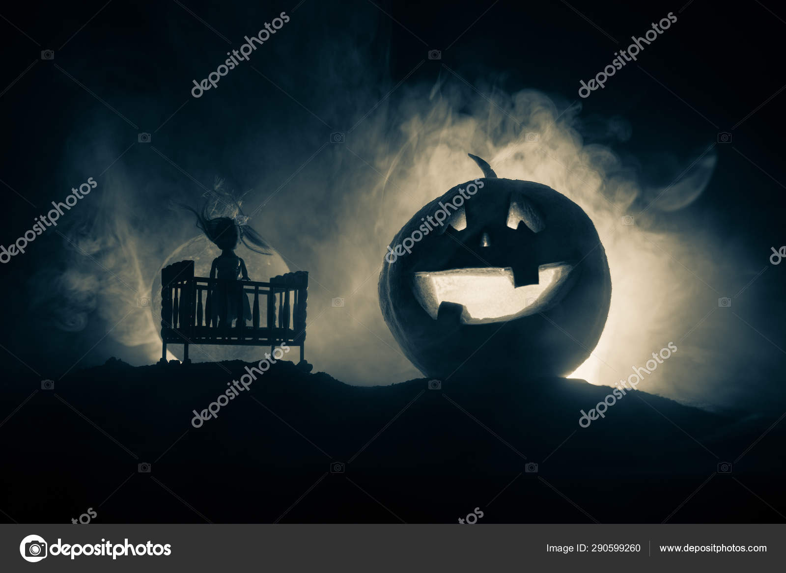 Old creepy eerie wooden baby crib in dark toned foggy background ...
