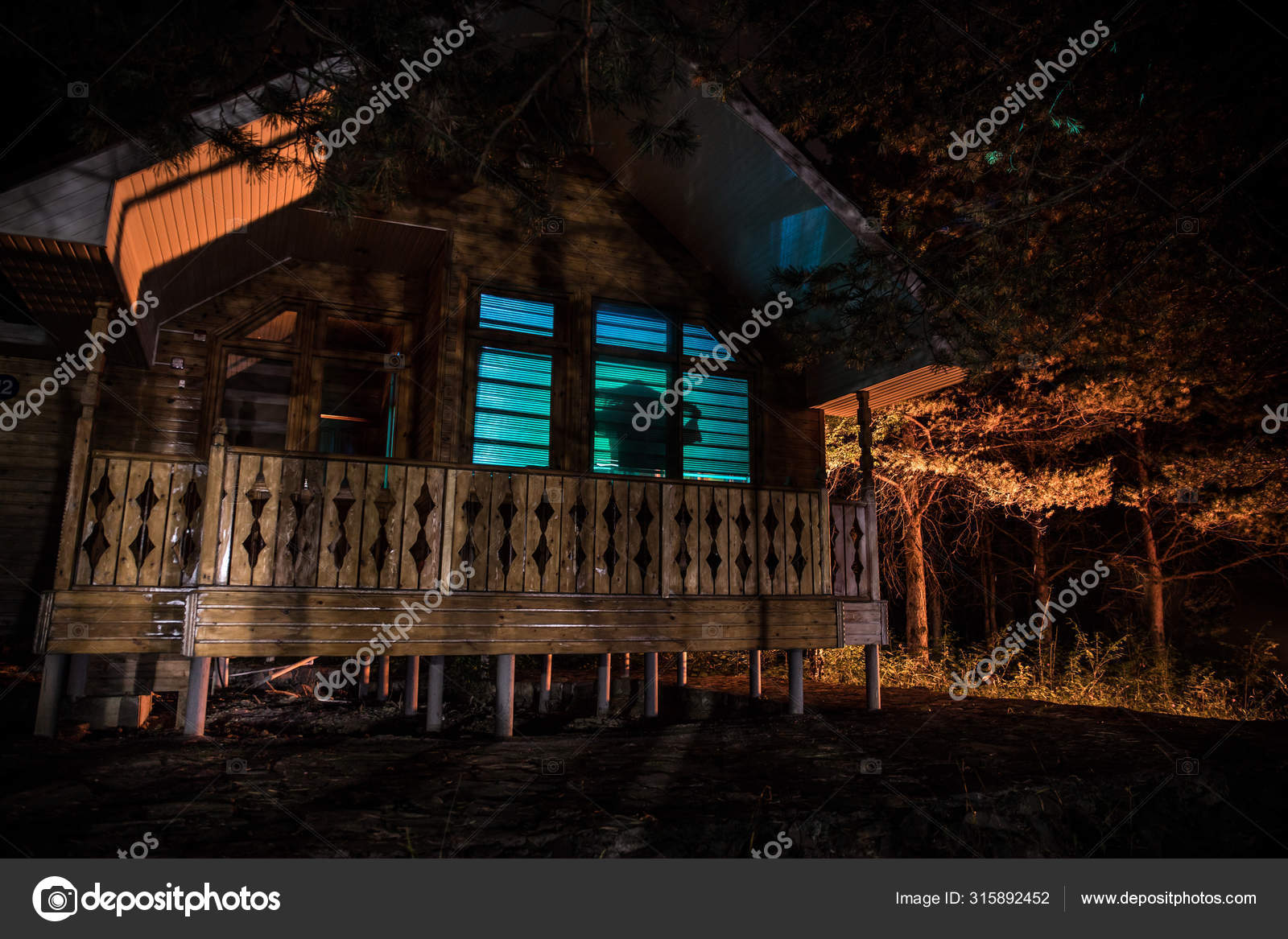 Old house with a Ghost in the forest at night or Abandoned Haunted ...