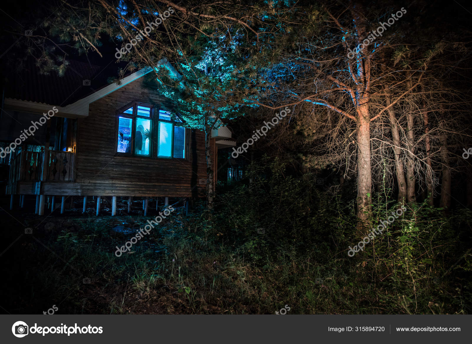 Old house with a Ghost in the forest at night or Abandoned Haunted ...
