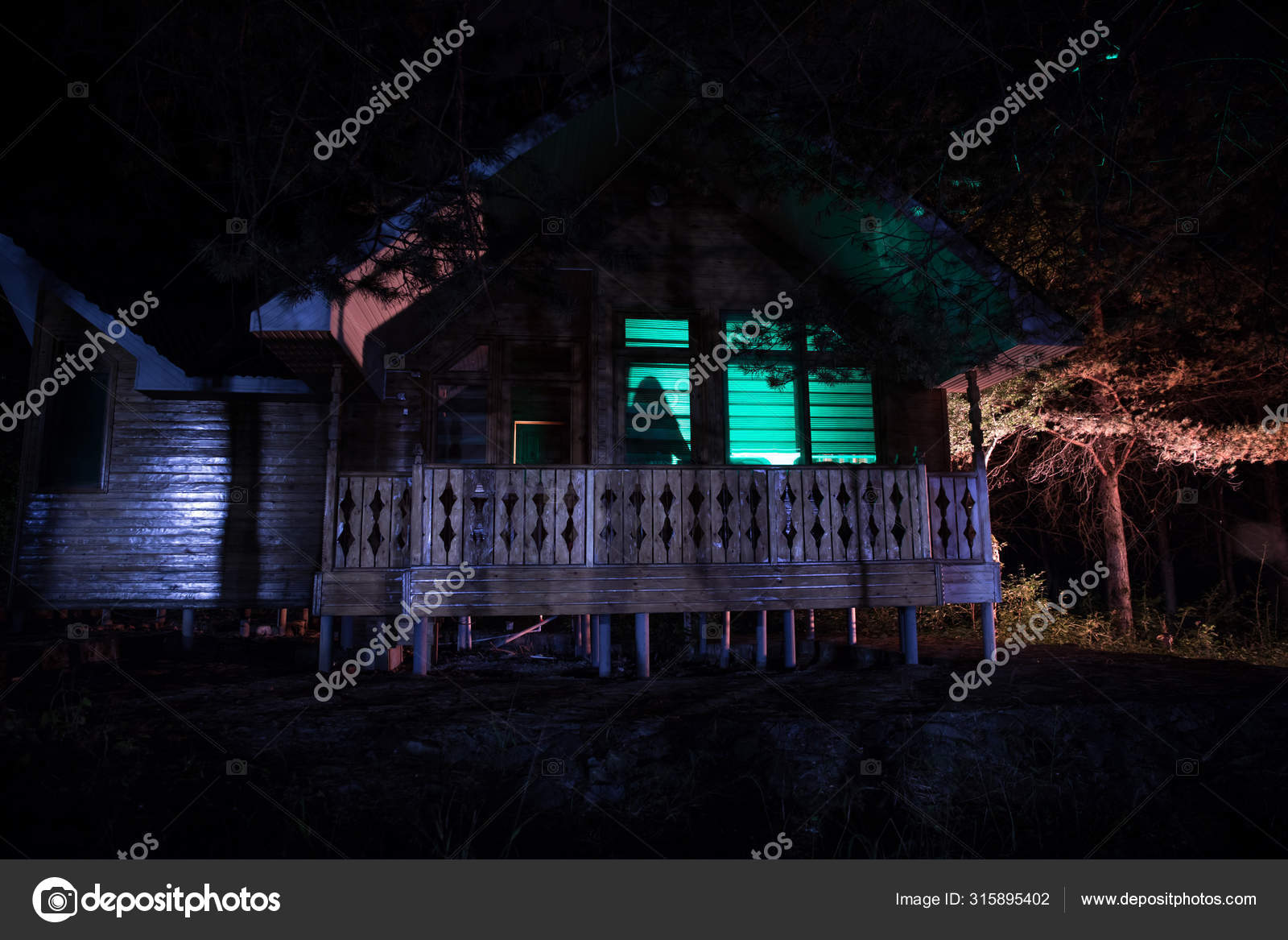 Old house with a Ghost in the forest at night or Abandoned Haunted ...