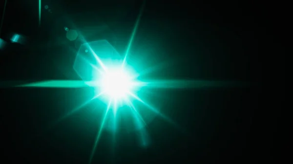 Realistic Len flare glow light effect on black background. Optic ...