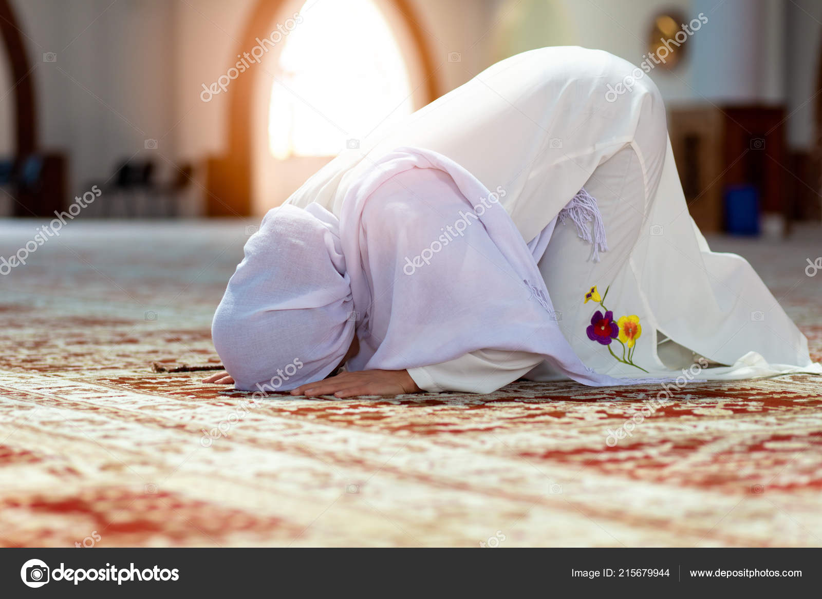 Muslim Praying On Knees