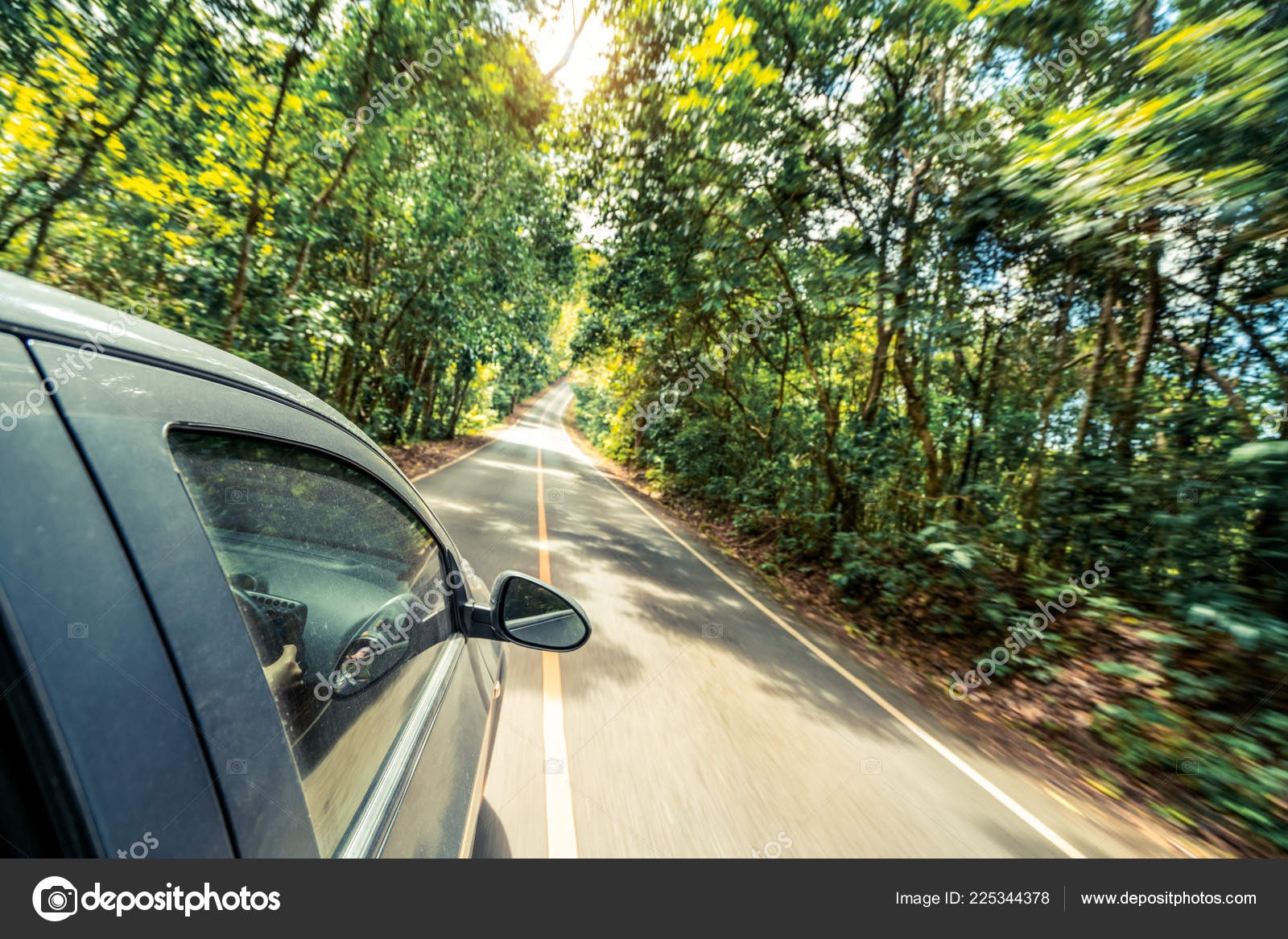 Car Driving On Road Side View