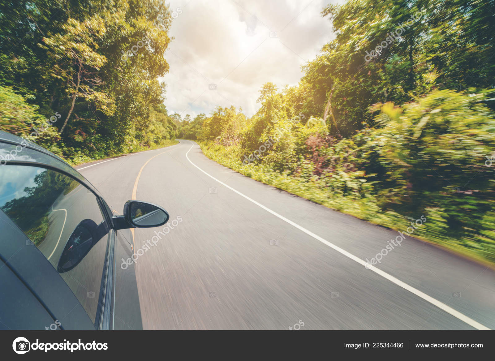 Car Driving On Road Side View