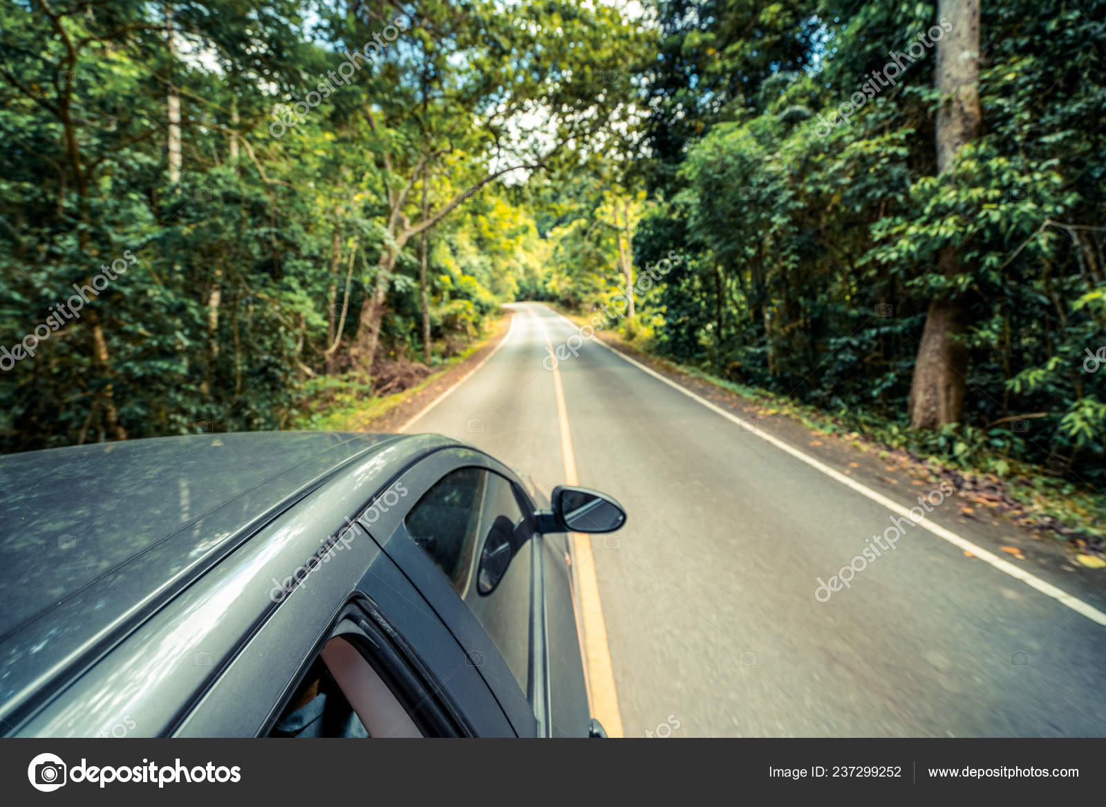 Car Driving On Road Side View