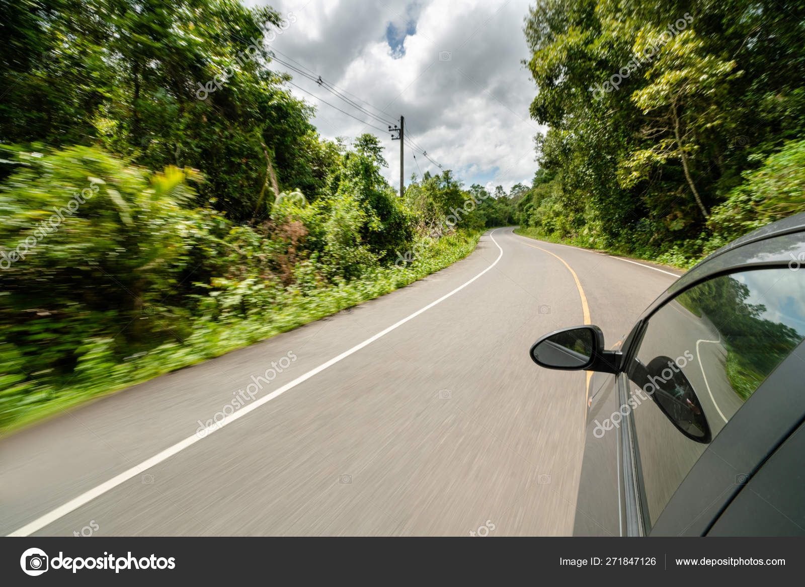 Car Driving On Road Side View