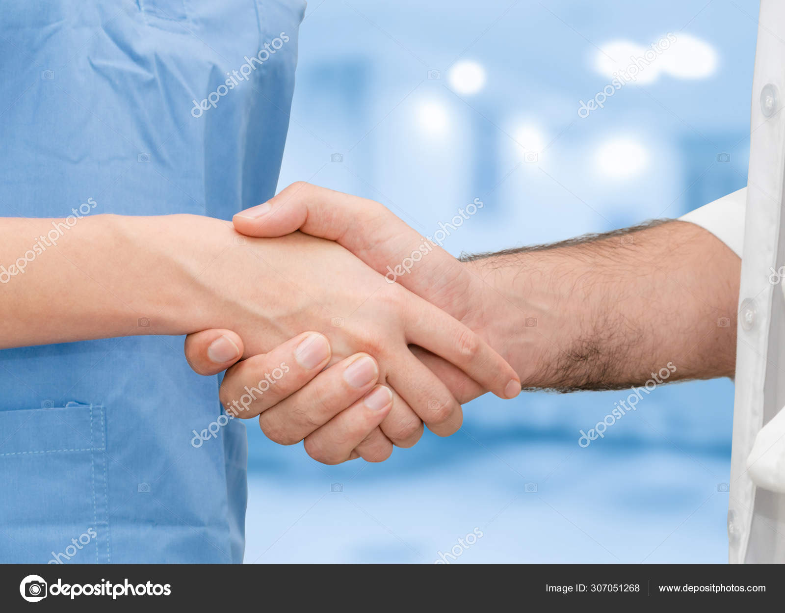 Doctor in hospital handshake with another doctor. Stock Photo by ...