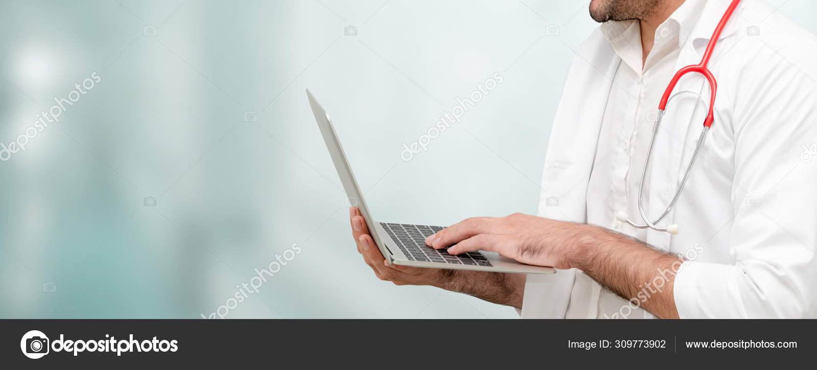 Doctor using laptop computer at the hospital. — Stock Photo ...