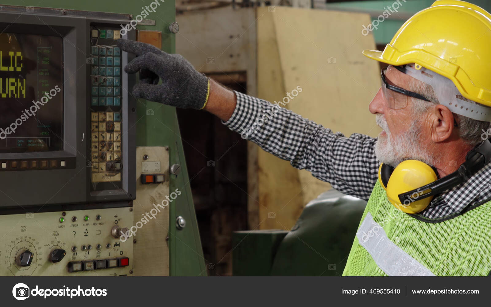 Smart factory worker using machine in factory workshop ⬇ Stock Photo ...